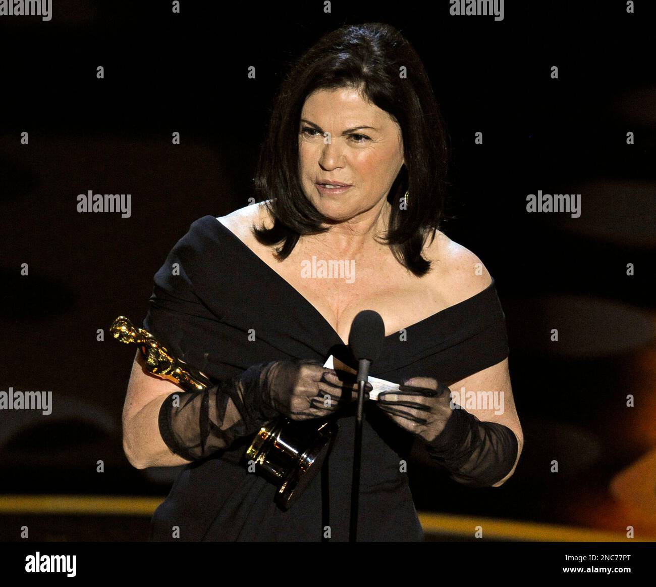 Colleen Atwood accepts the Oscar for best costume design for "Alice in ...