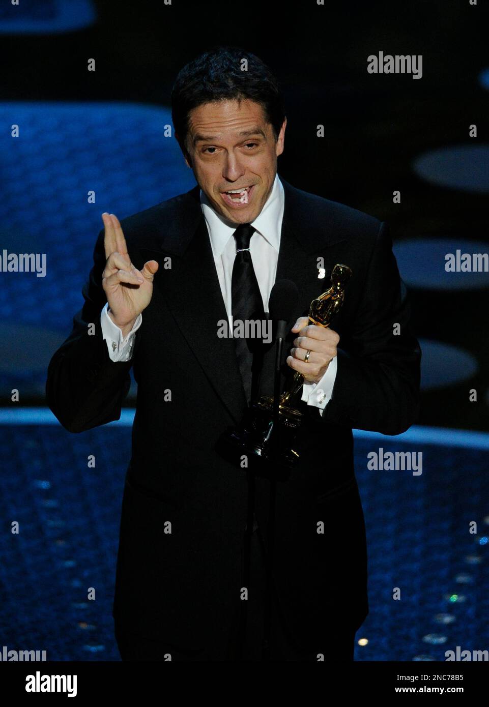 Lee Unkrich accepts the Oscar for best animated feature film for "Toy ...