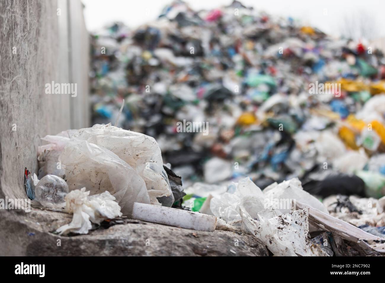 Landfill site, a pile of stinky different junk disposal in the concrete ...