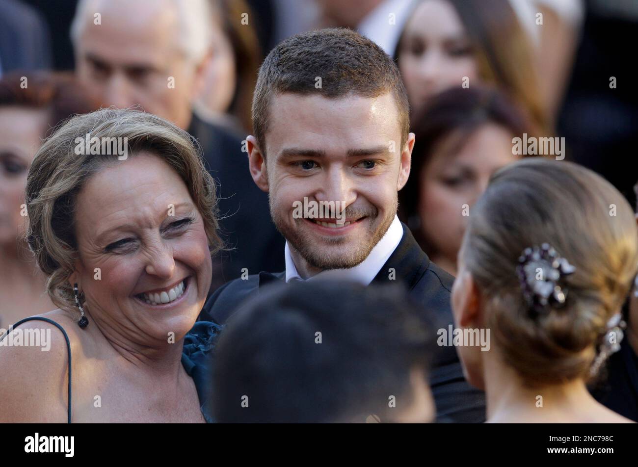 Actor Justin Timberlake, center, and his mother Lynn Harless, left ...