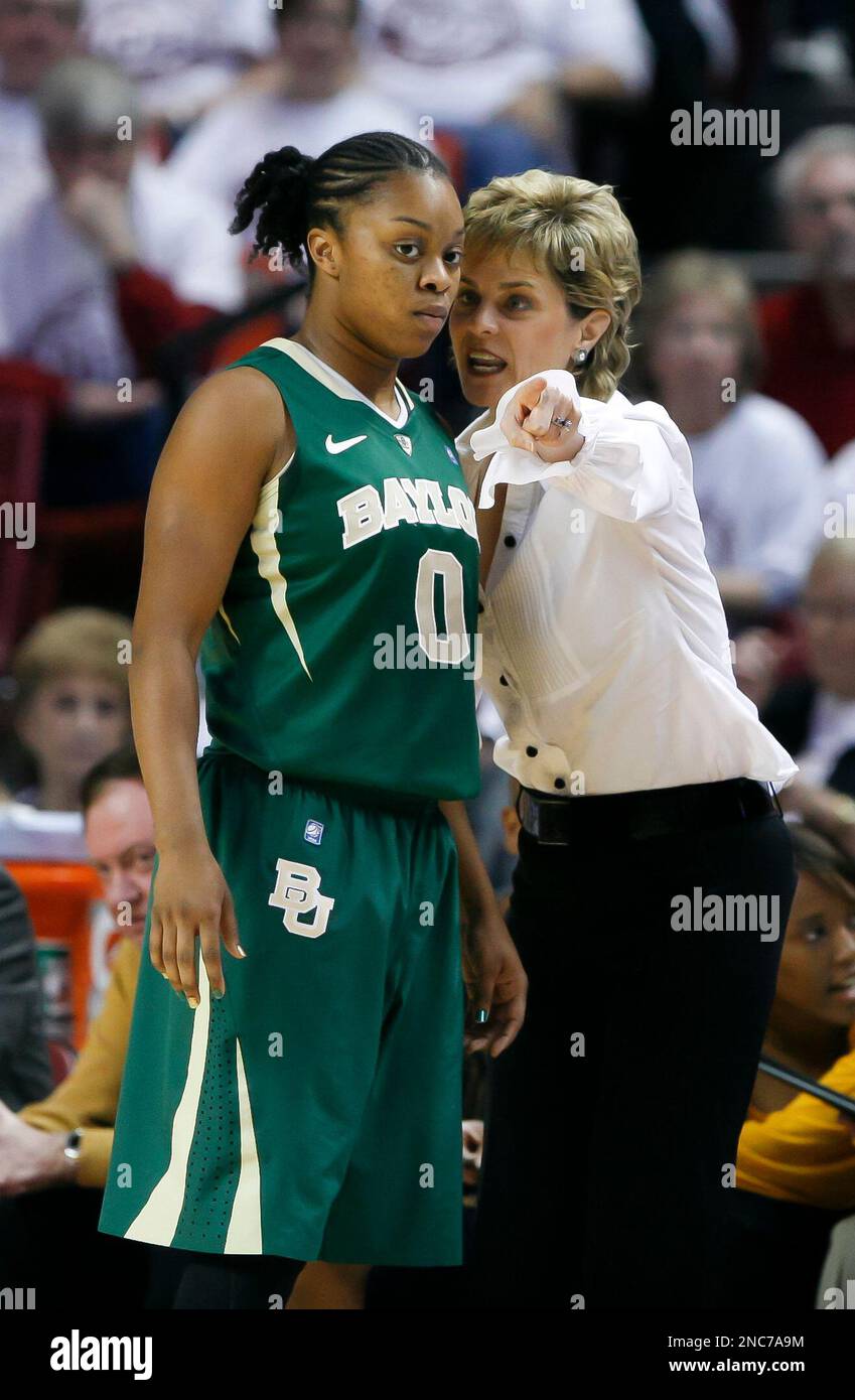Baylor guard Odyssey Sims, left, talks with coach Kim Mulkey during an ...
