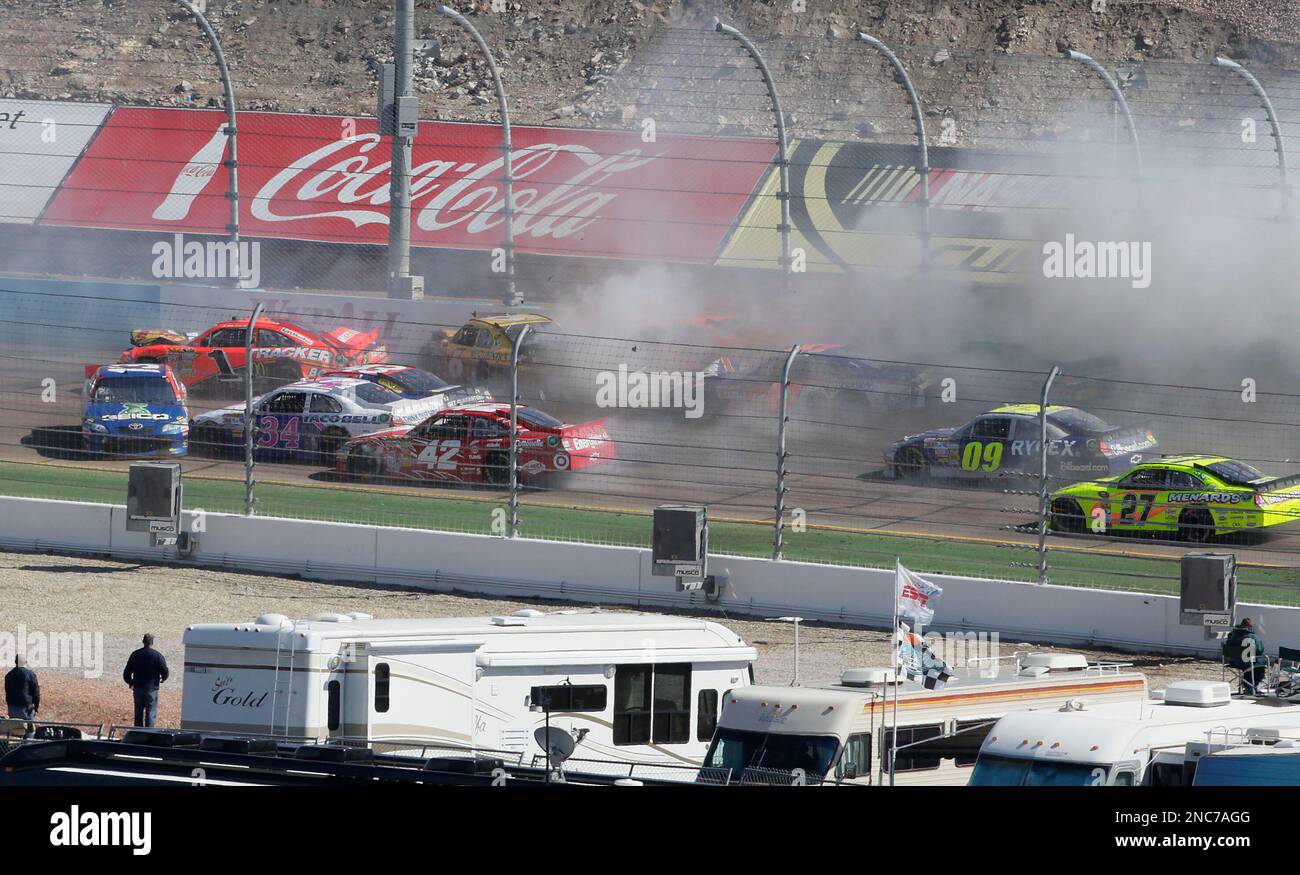Cars pile up in a crash during the NASCAR Sprint Cup Series auto race ...