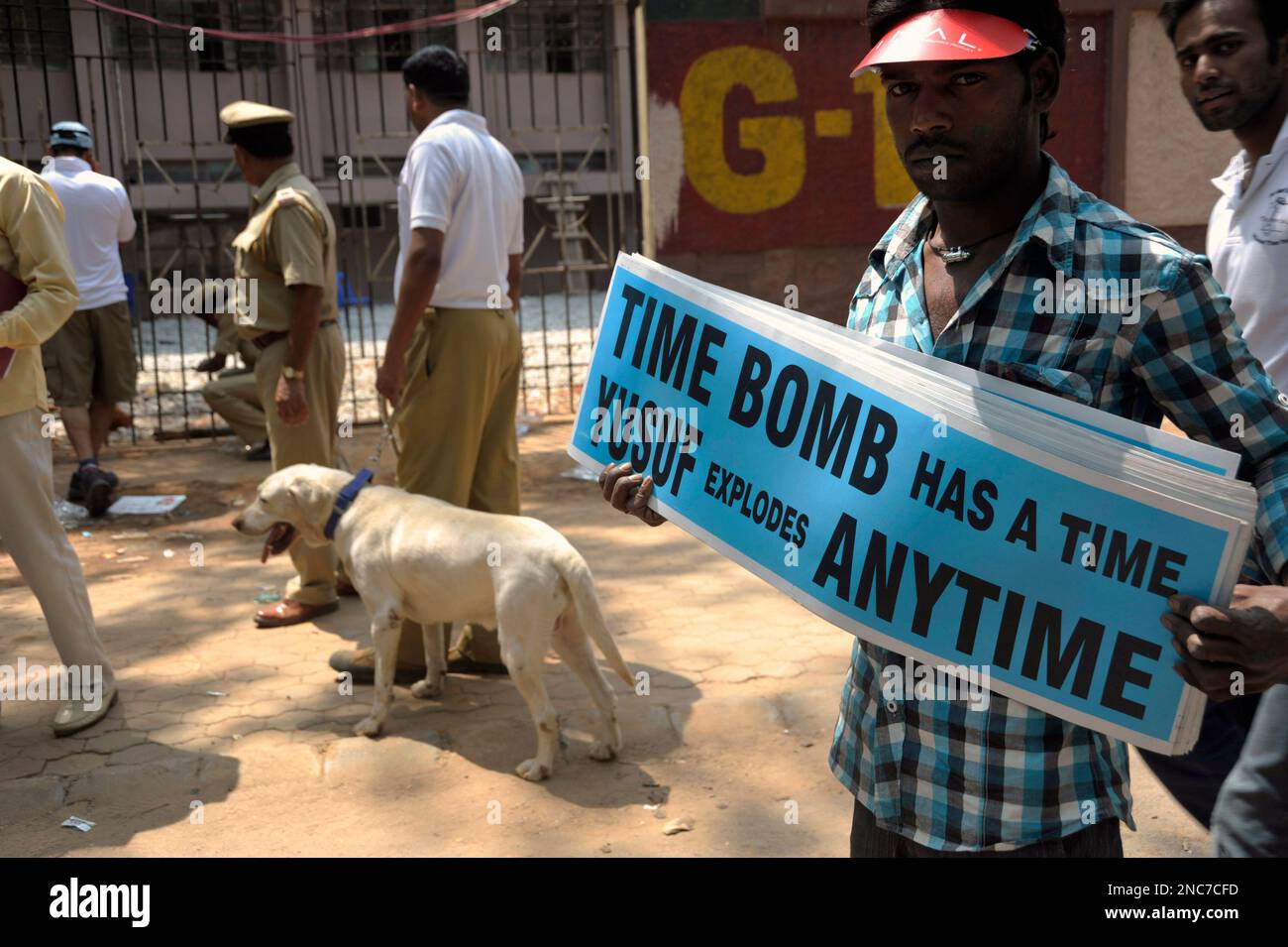 A man sells ready made placards supporting Indian cricketer Yusuf ...