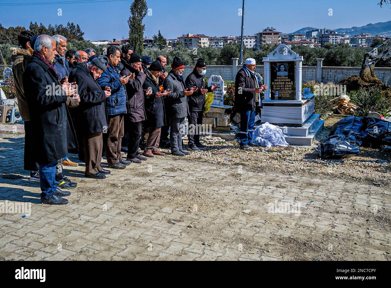 Mourners hold prayers over corpses of the three children who were ...
