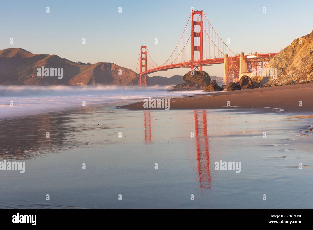 Marshall's Beach at sunset with the Golden Gate Bridge in the distance ...