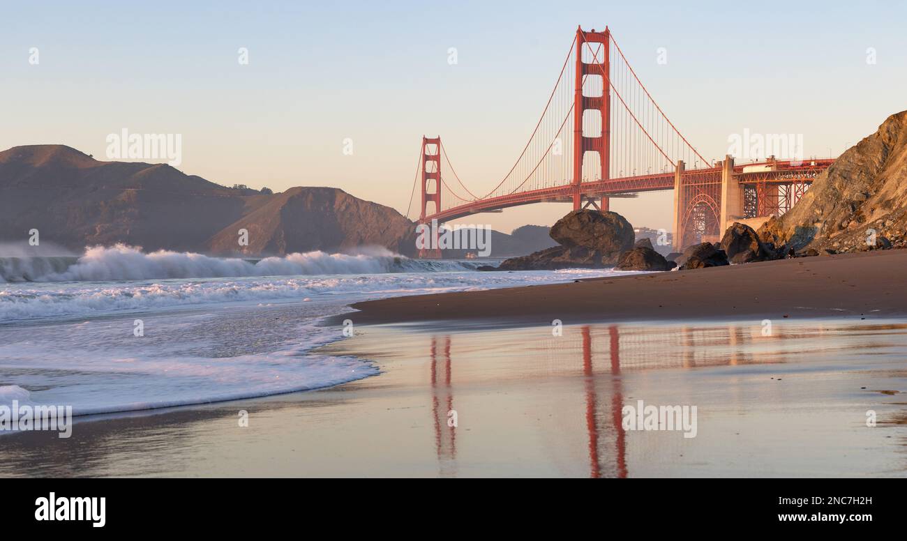 Marshall's Beach at sunset with the Golden Gate Bridge in the distance ...