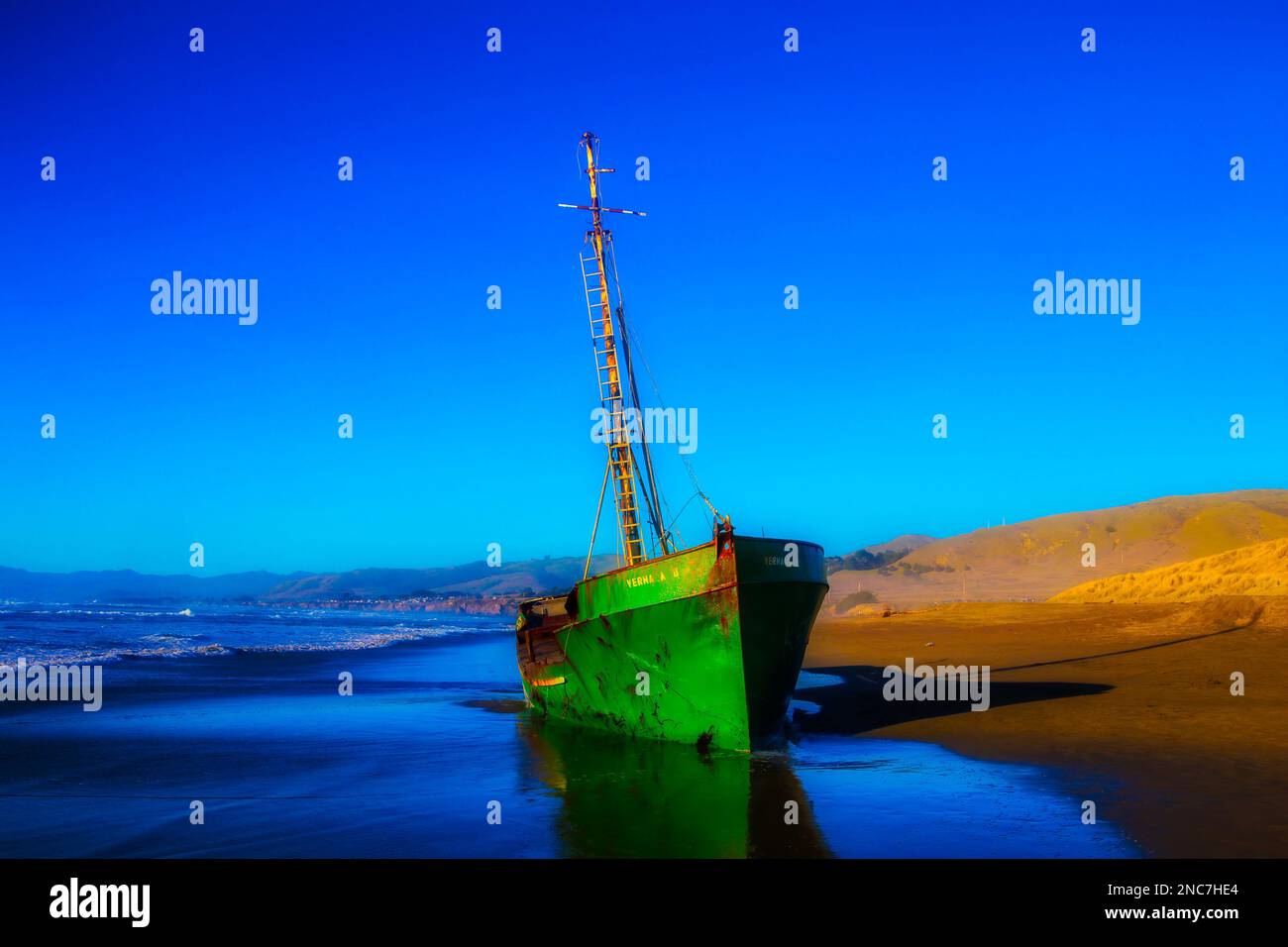 Beached Old Green Fishing Boat Stock Photo - Alamy