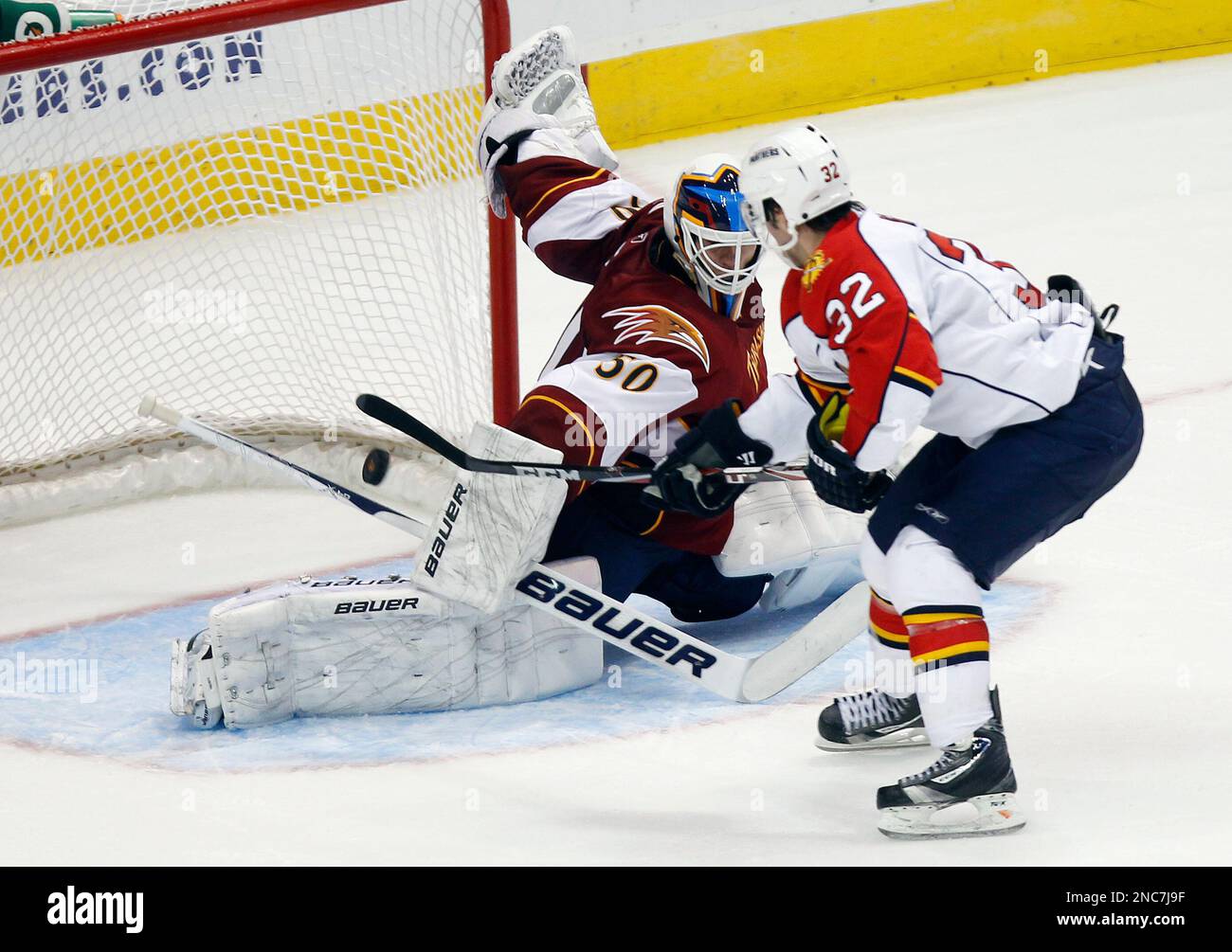 Atlanta Thrashers goalie Chris Mason (50) blocks a shot from Florida ...