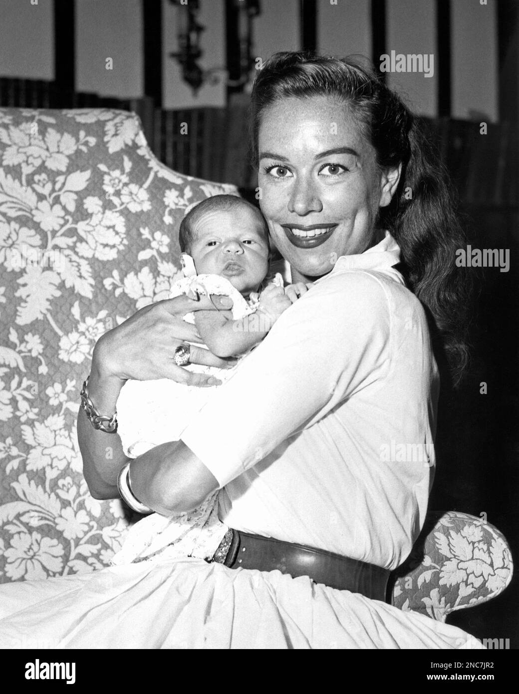 Opera star Patrice Munsel hugs her son, Rhett Carroll Schuler, in her ...