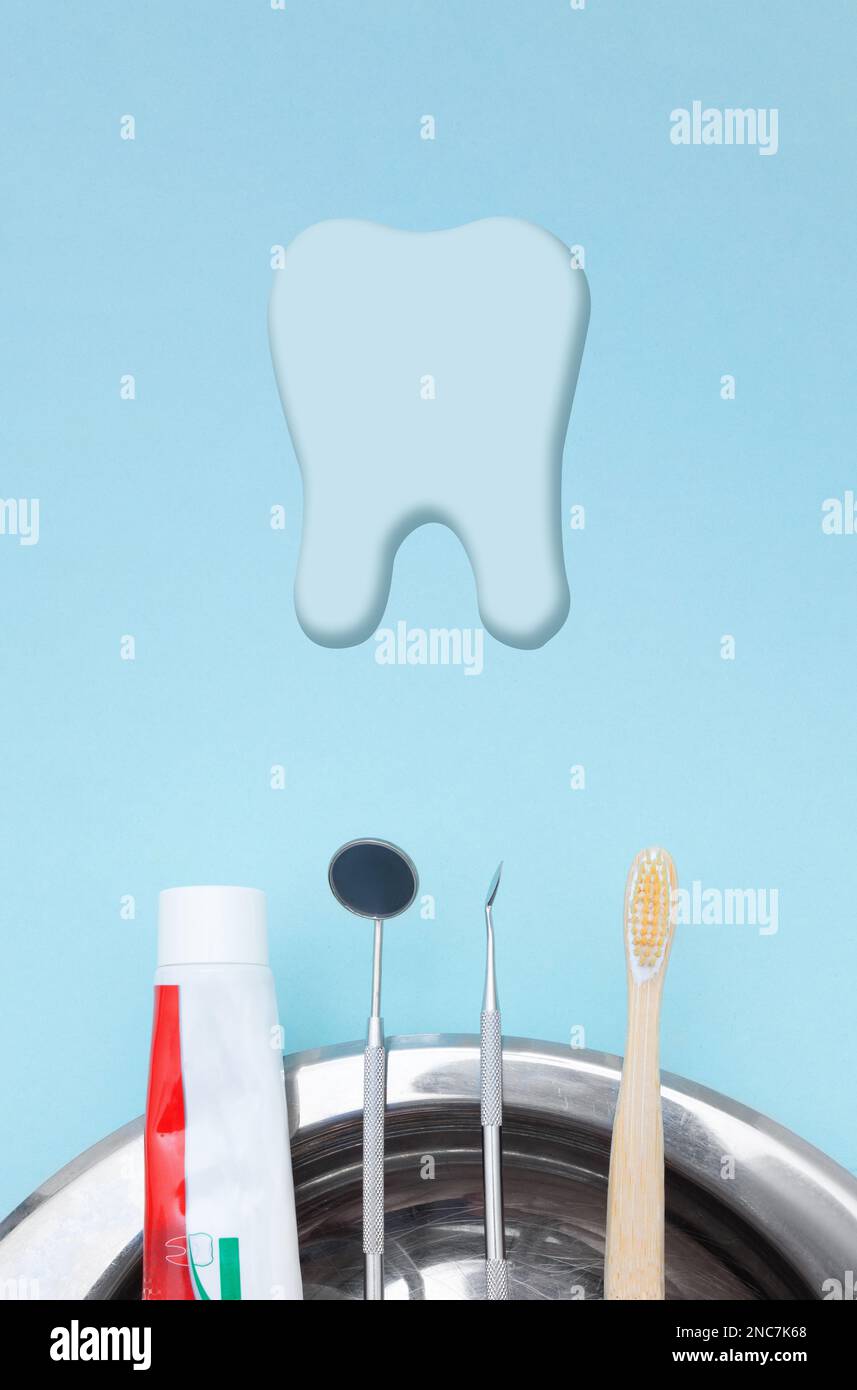 Different tools for dental care, toothbrush, toothpaste and molar tooth ...