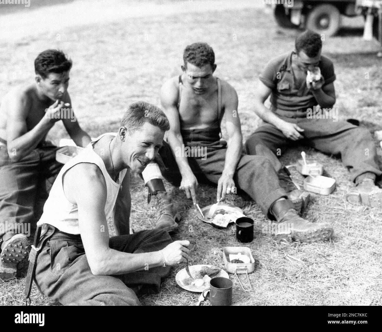 Four members of the Canadian Highland Light Infantry take their compo ...