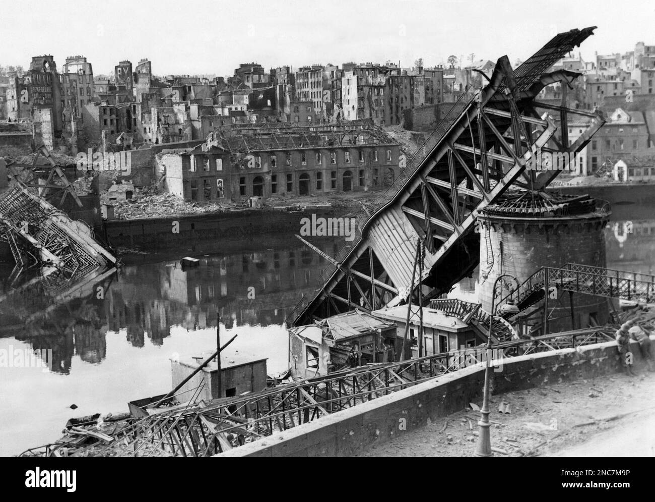 The smashed Joan of Arc bridge, in the wrecked harbour of Brest, France ...