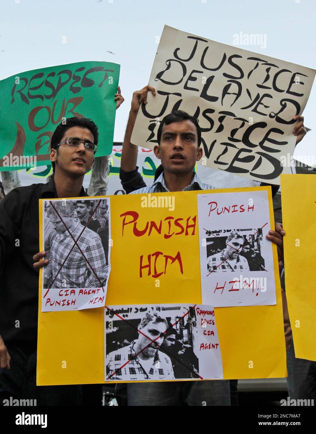 Pakistani students rally against an American CIA employee Raymond Allen ...