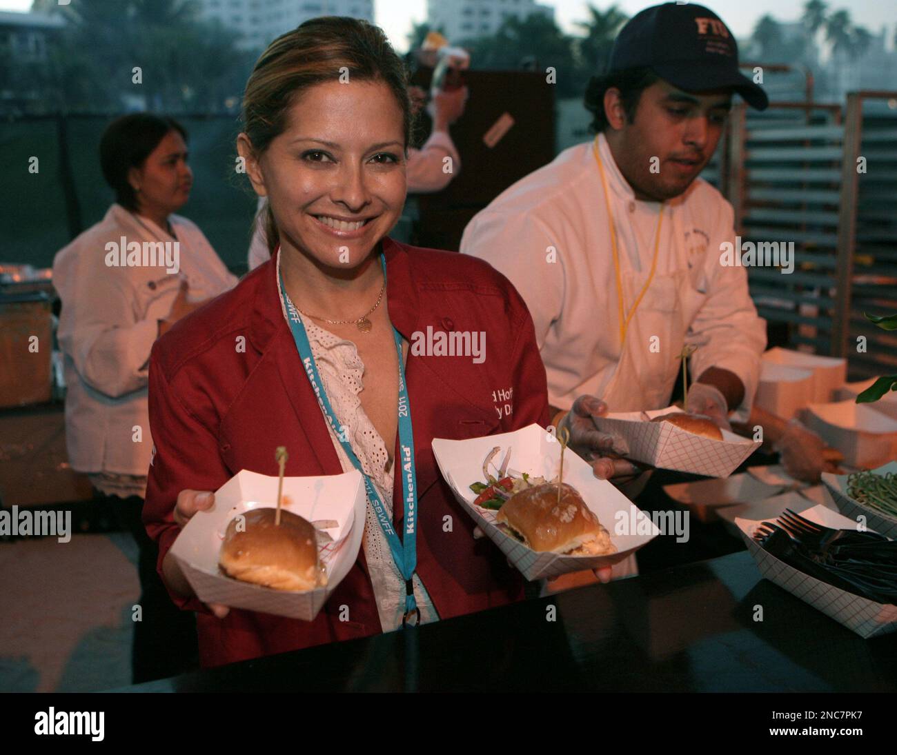 Ingrid Hoffman serving her famous burgers at the FIJI Water sponsored Amstel Light Burger Bash ...
