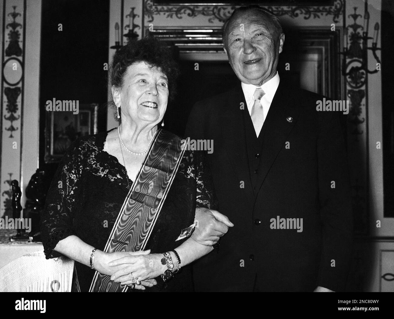 German chancellor Konrad Adenauer, right, holds the arm of Amelie ...