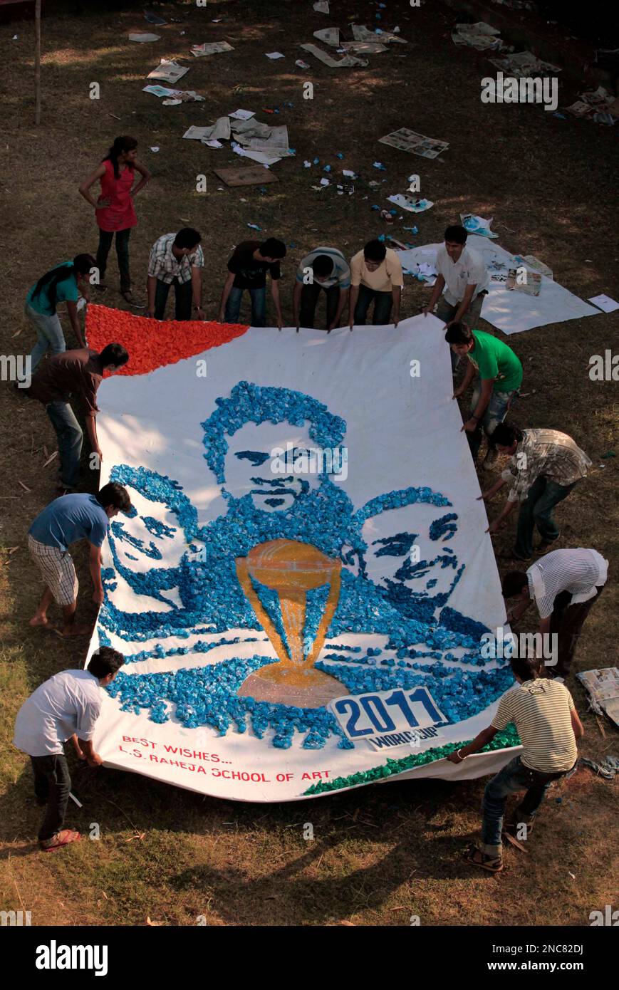 Indian students from Raheja school of art display an artwork they ...
