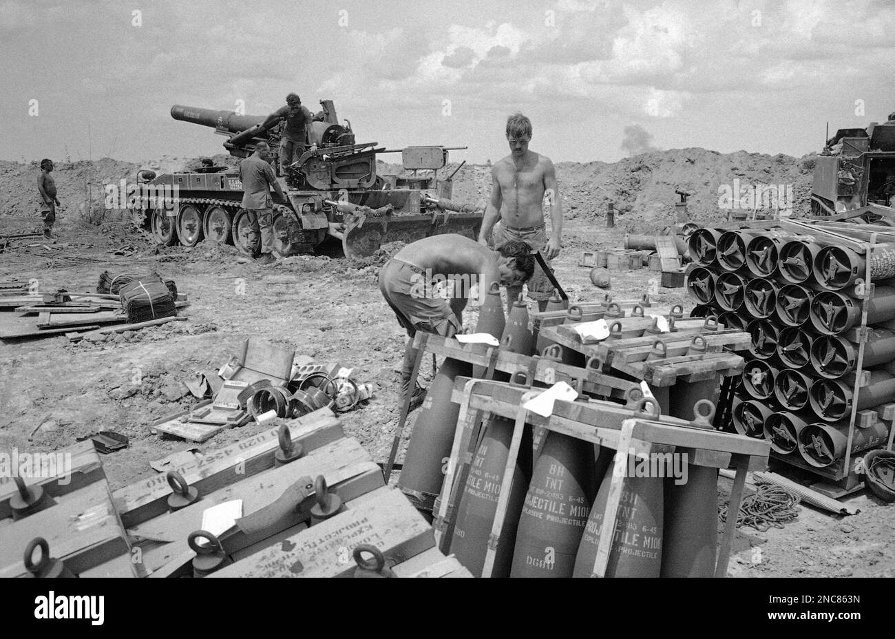 American GIs stack artillery shells for their self-propelled eight-inch ...