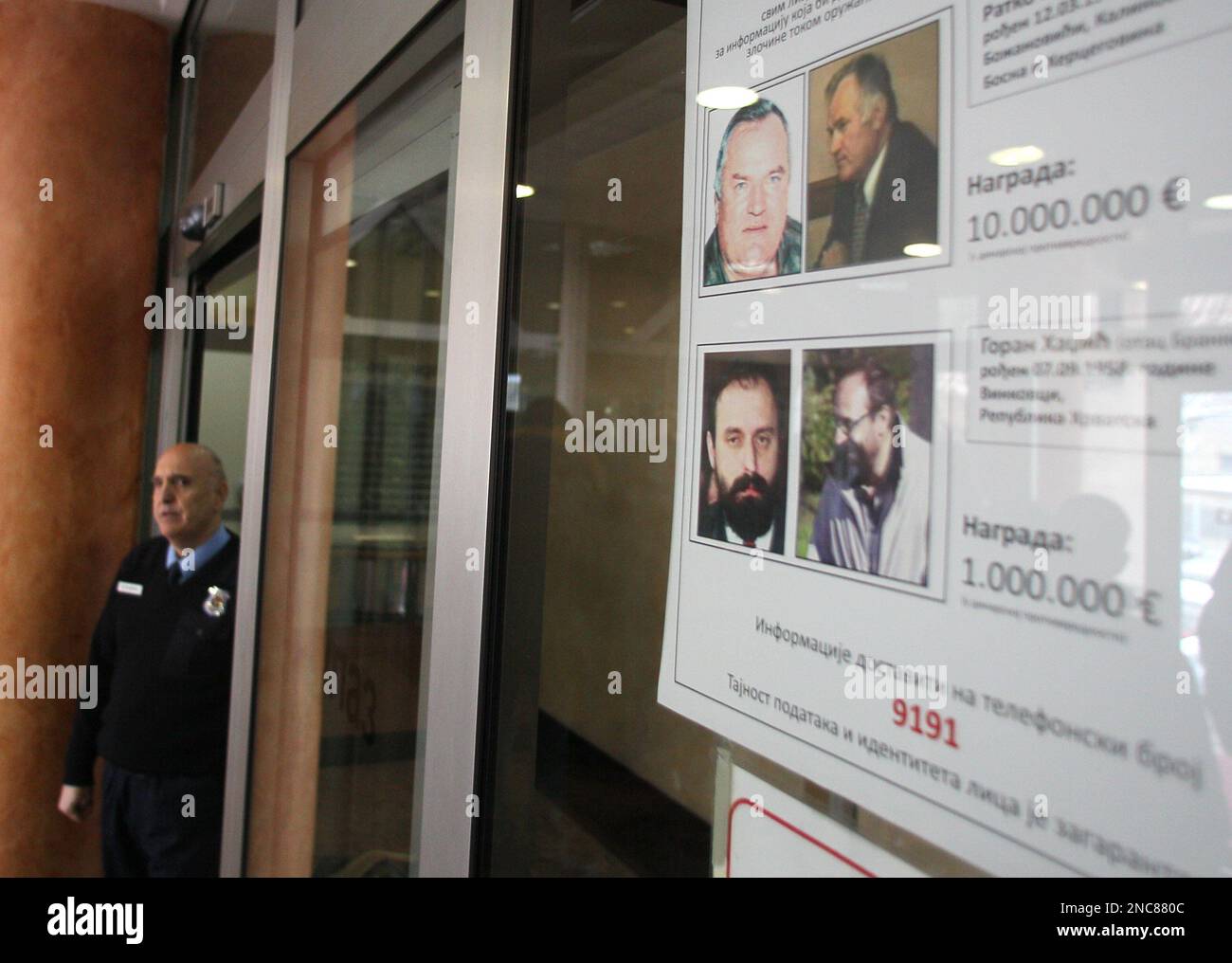 A wanted poster of wartime Bosnian Serb army commander Ratko Mladic and ...