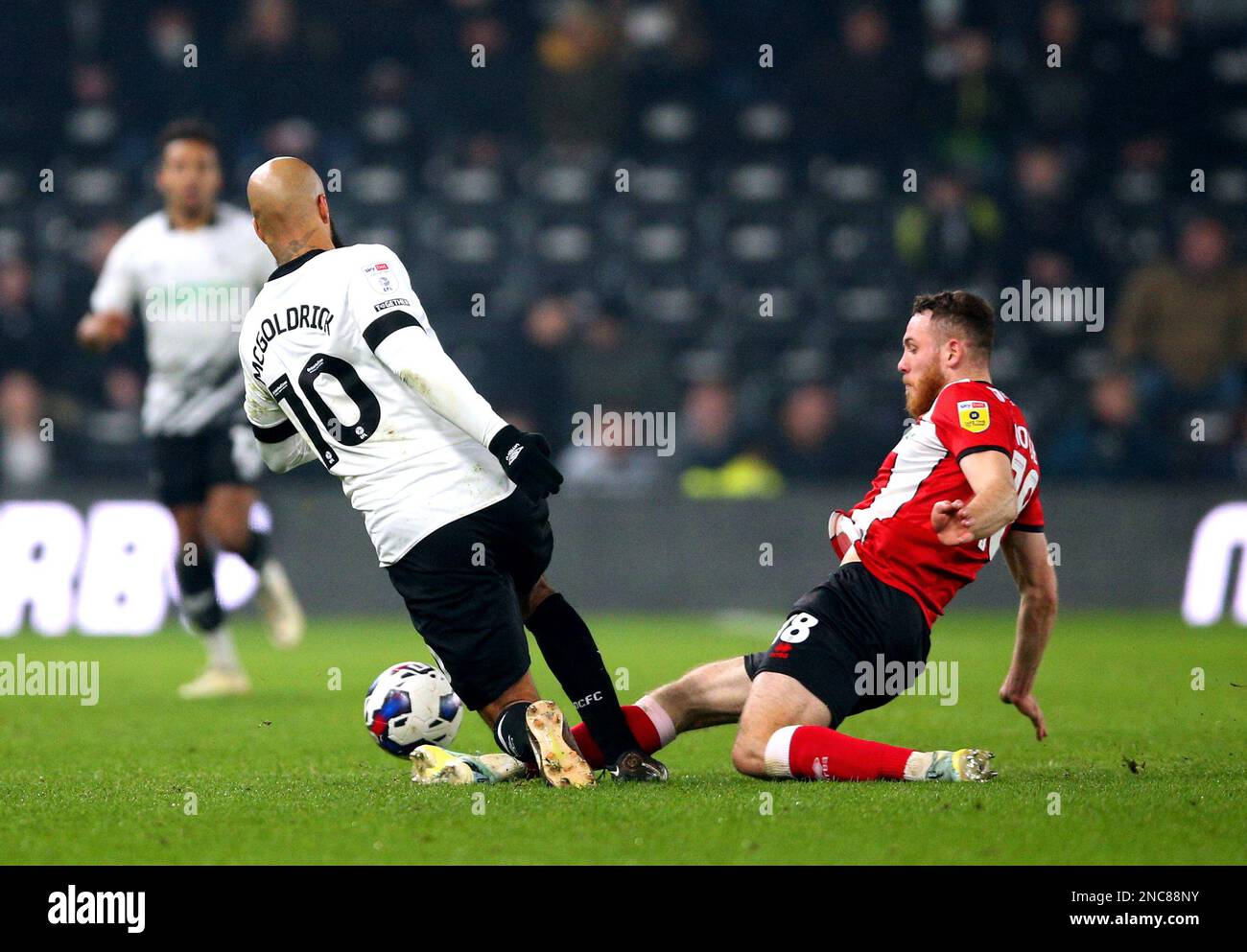Lincoln City's Ben House fouls Derby County's David McGoldrick ...
