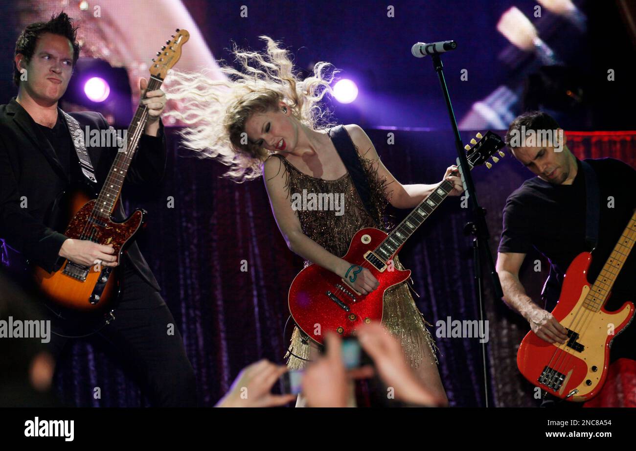U.S. singer-songwriter Taylor Swift, center performs in Hong Kong as ...