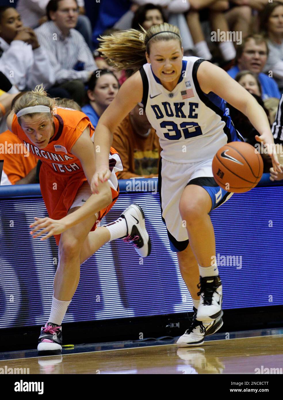 Duke's Tricia Liston (32) and Virginia Tech's Alyssa Fenyn chase the ...