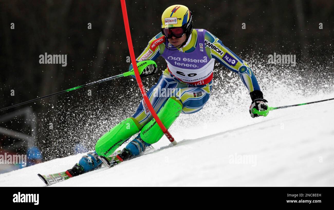 Slovenia's Mitja Valencic clears a gate during the first run of the men ...
