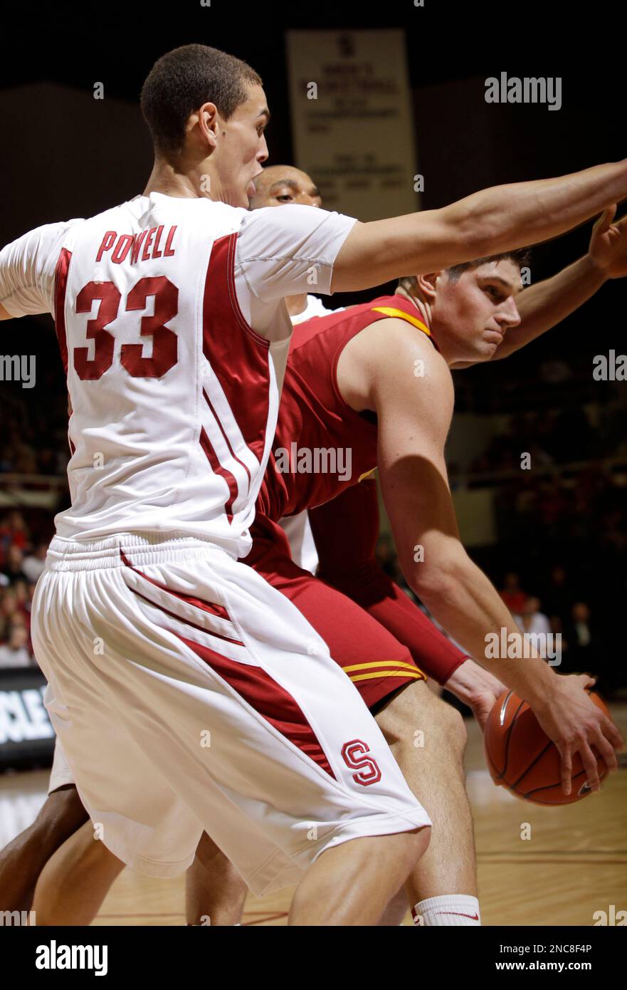 Southern California forward Nikola Vucevic, right, is closely guarded ...