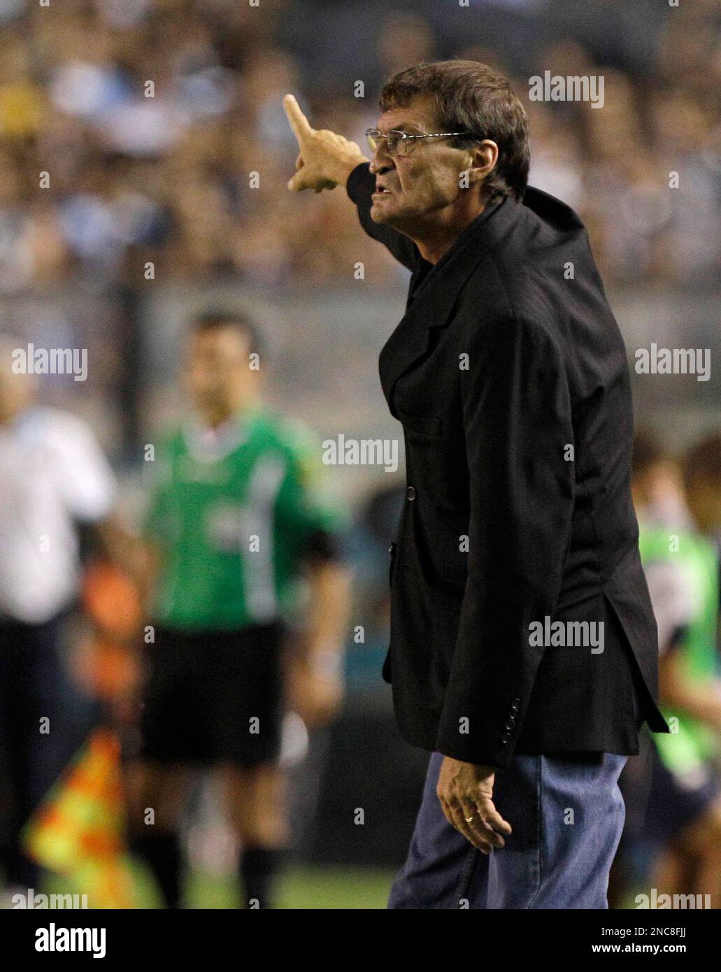 Julio Cesar Falcioni, coach of Boca Juniors, shouts instructions to his ...