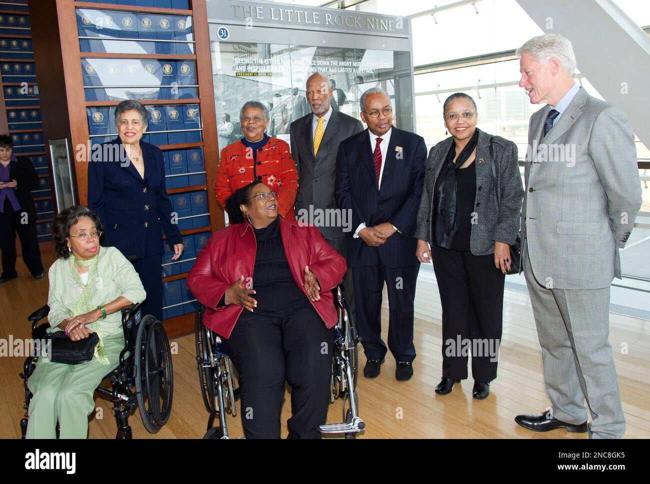 Members of the Little Rock Nine, standing from left, Carlotta Walls ...