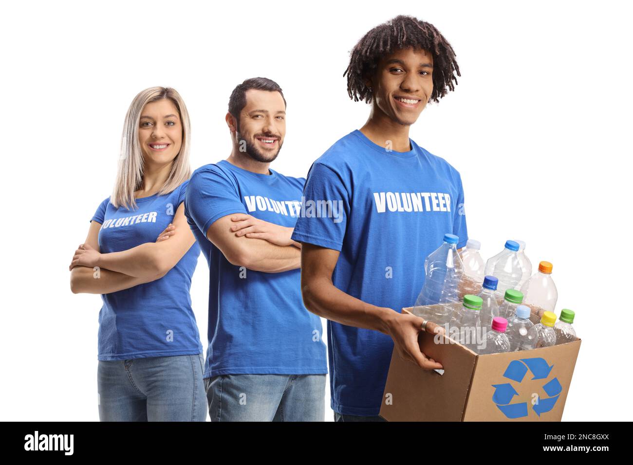 Group of young volunteers posing with a box of plastic bottles for ...
