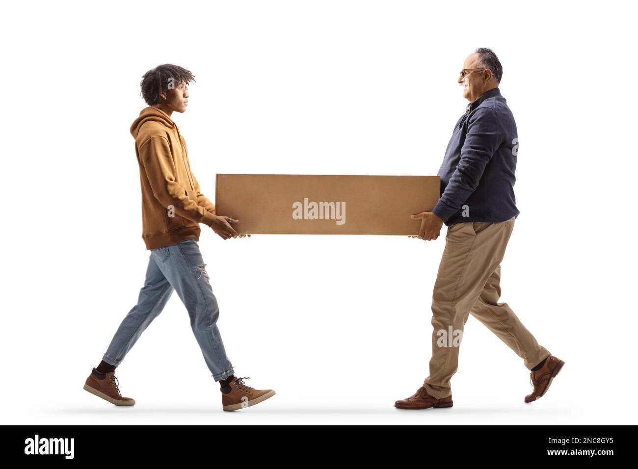 Mature man and a young african american guy carrying a cardboard box ...