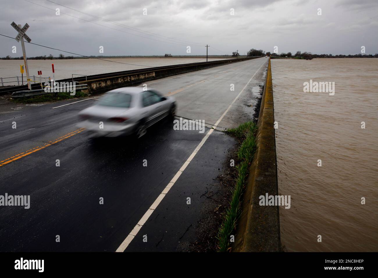 The Yolo Bypass, (left) filled with water from the Sacramento River ...