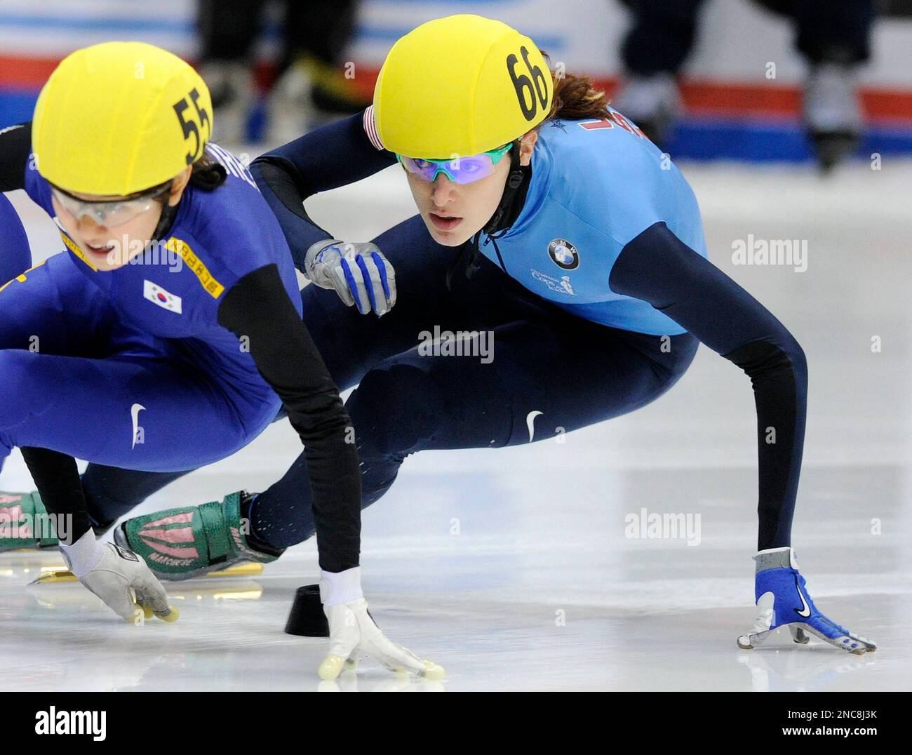 Katherine Reutter of the U.S., right, competes besides Hyun-Sun Hwang ...