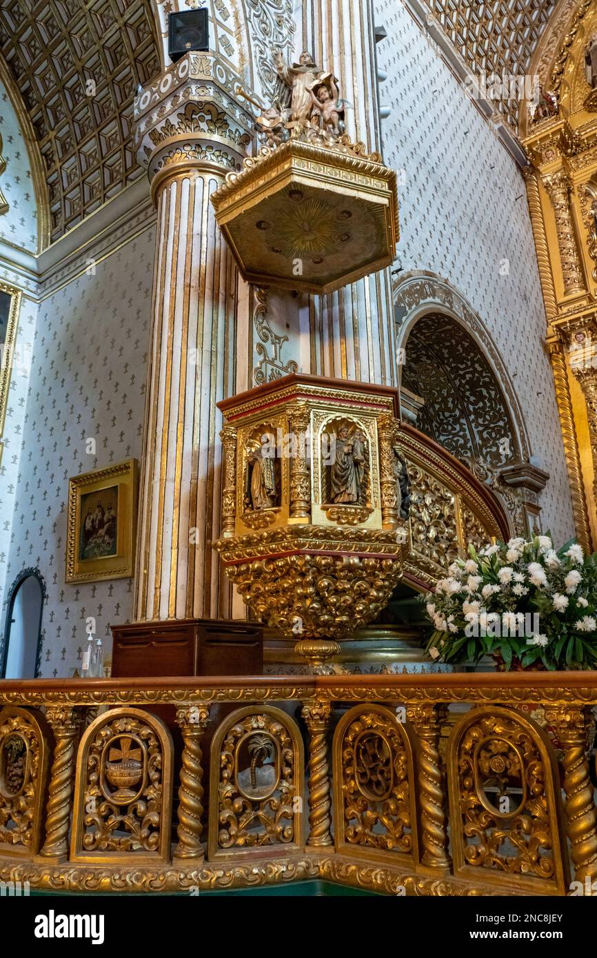 The gilded pulpit of the very ornate Church of Santo Domingo de Guzman ... The gilded pulpit of the very ornate Church of Santo Domingo de Guzman ...