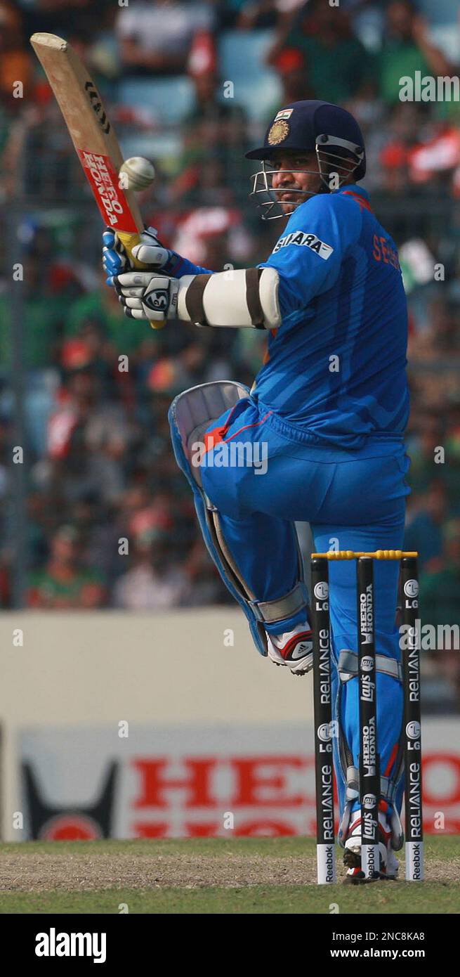 India's Virender Sehwag play a shot in the opening cricket World Cup ...