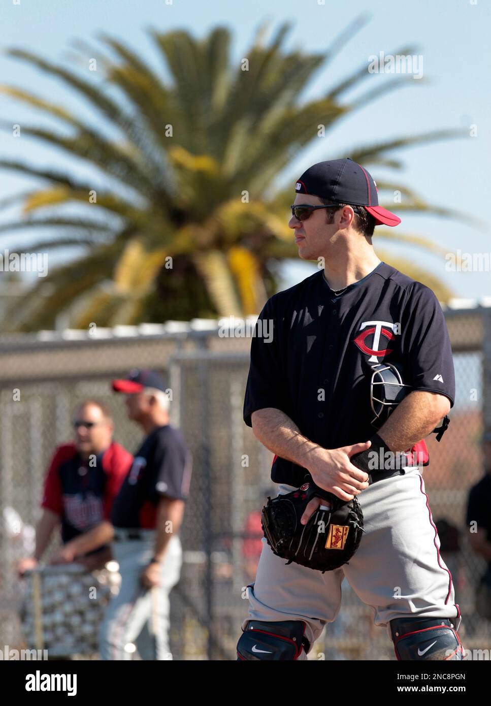 Minnesota Twins catcher Joe Mauer works with pitchers during the first ...