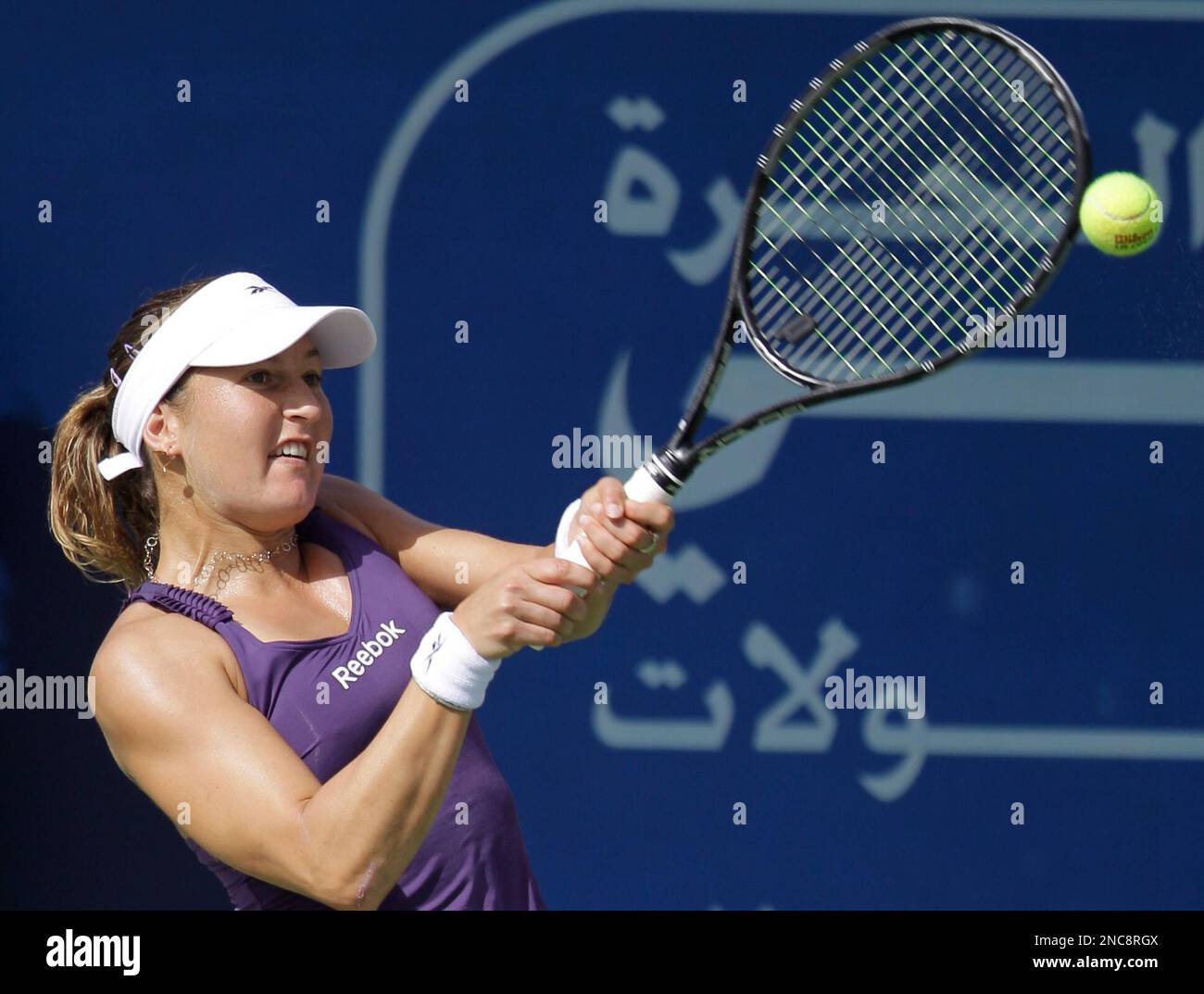 Shahar Peer from Israel returns the ball to Denmark's Caroline ...