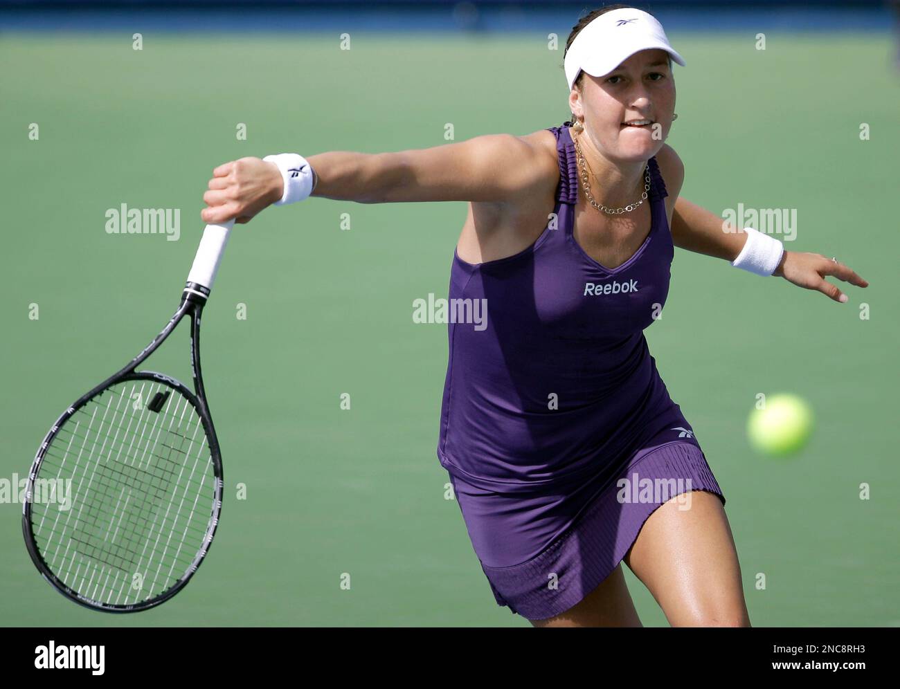 Shahar Peer from Israel returns the ball to Denmark's Caroline ...