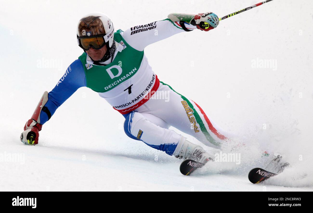 Italy's Massimiliano Blardone takes a curve during the first run of the ...