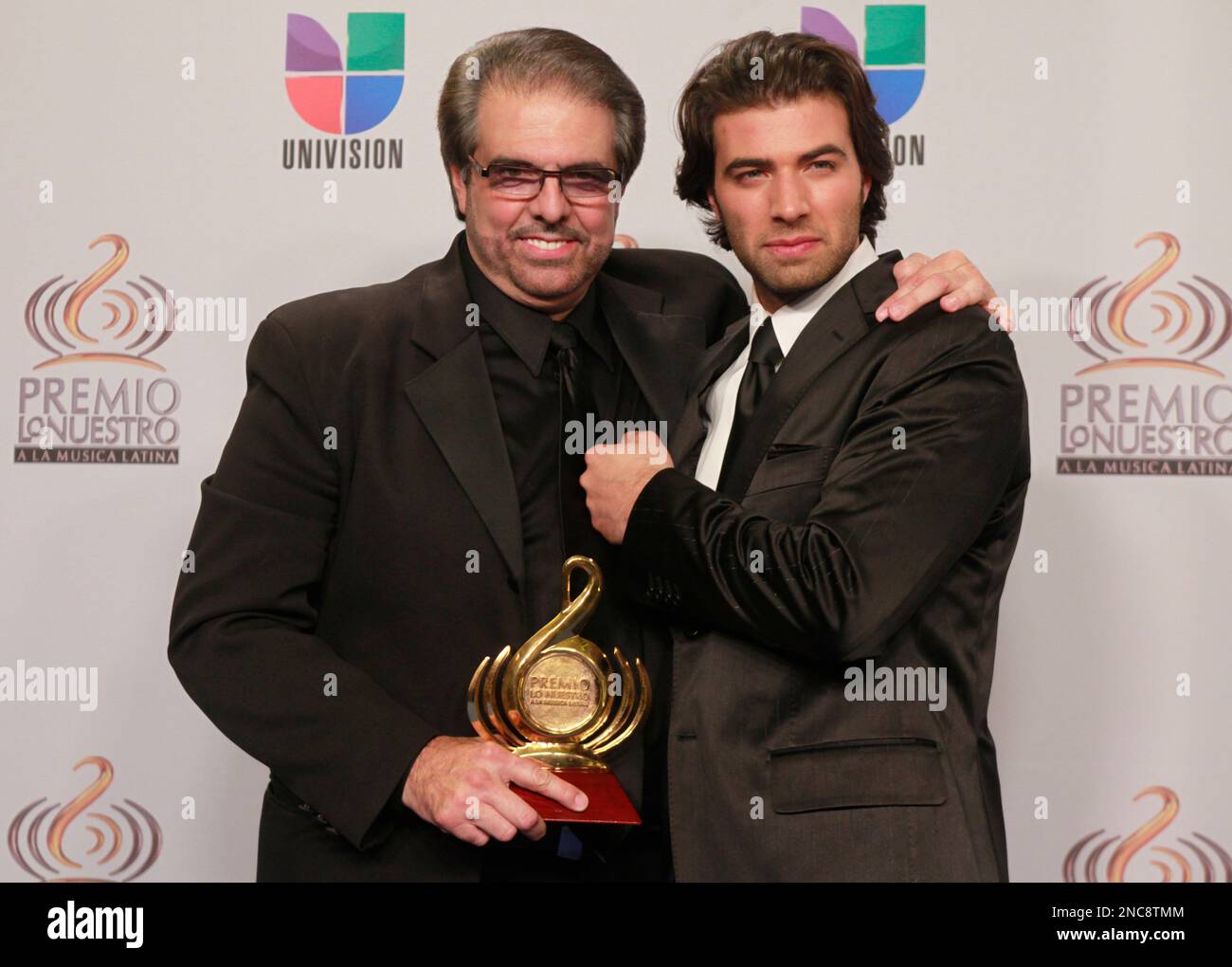 JenCarlos Canela, right, poses with his father Heriberto Canela ...