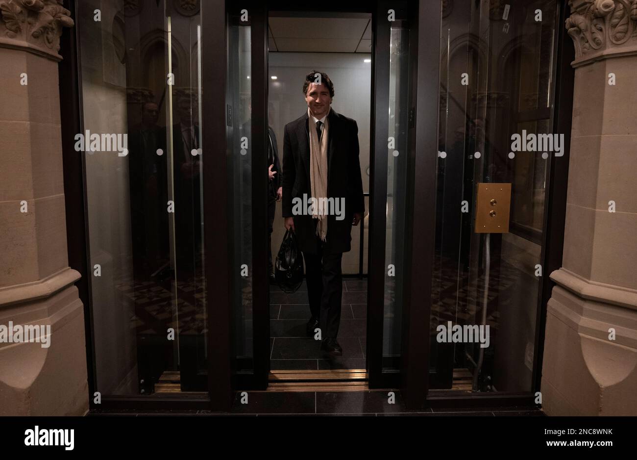 Prime Minister Justin Trudeau steps out of the elevator as he arrives on Parliament Hill for a ...