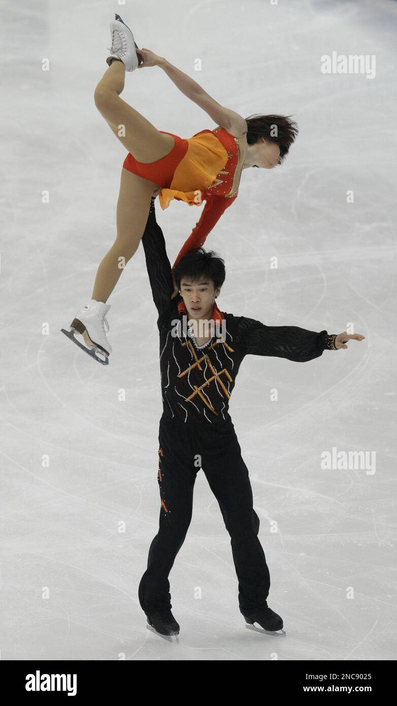 China's Dong Huibo and Wu Yiming perform during the pairs short program ...
