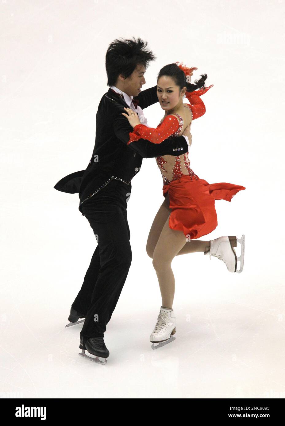 Yu Xiaoyang and Wang Chen of China perform during the ice dance short ...