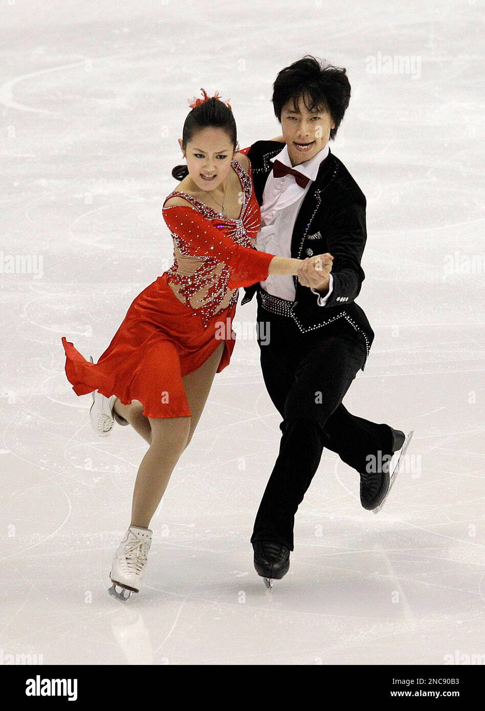 Yu Xiaoyang and Wang Chen of China perform during the ice dance short ...