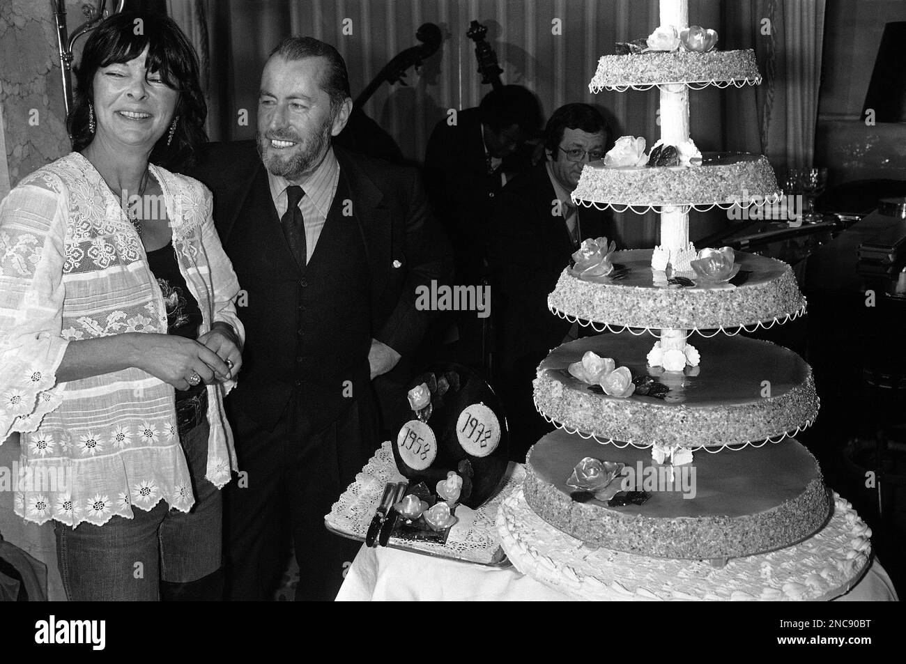 French artist Bernard Buffet with wife Annabel Schwob prepare to cut a ...