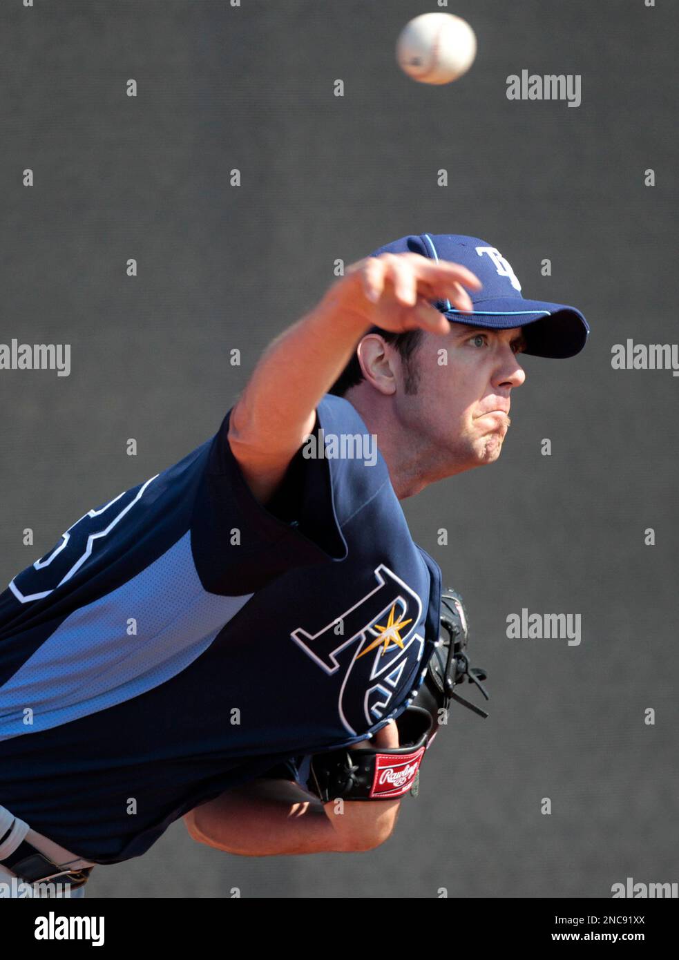 Tampa Bay Rays pitcher Dirk Hayhurst throws on the first day of ...