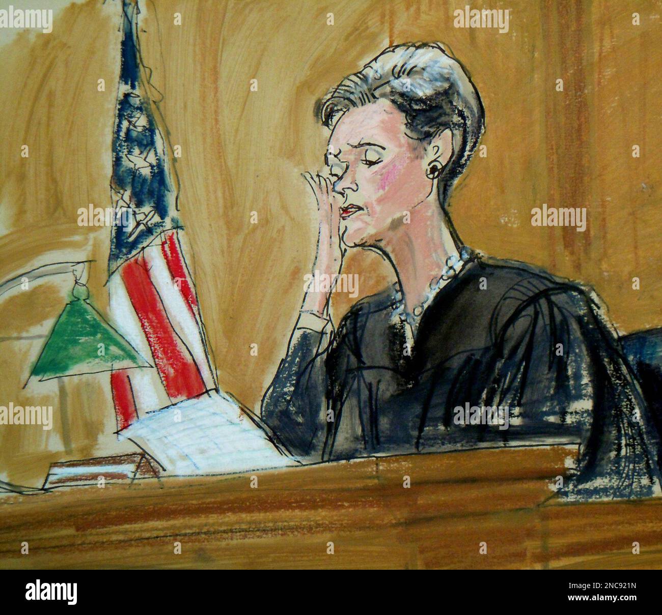 In this courtroom drawing, U.S. District Judge Loretta A. Preska chokes ...