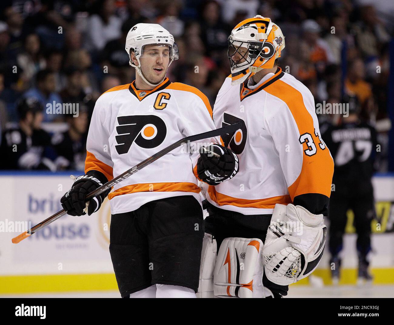 Philadelphia Flyers center Jeff Carter and goaltender Brian Boucher ...
