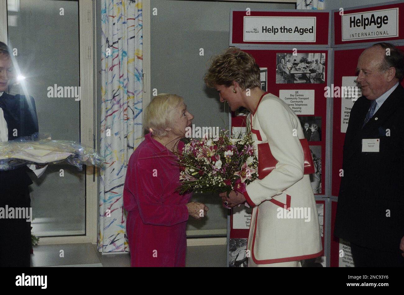 Princess Diana, the Princess of Wales receiving flowers from Mrs. Madge ...