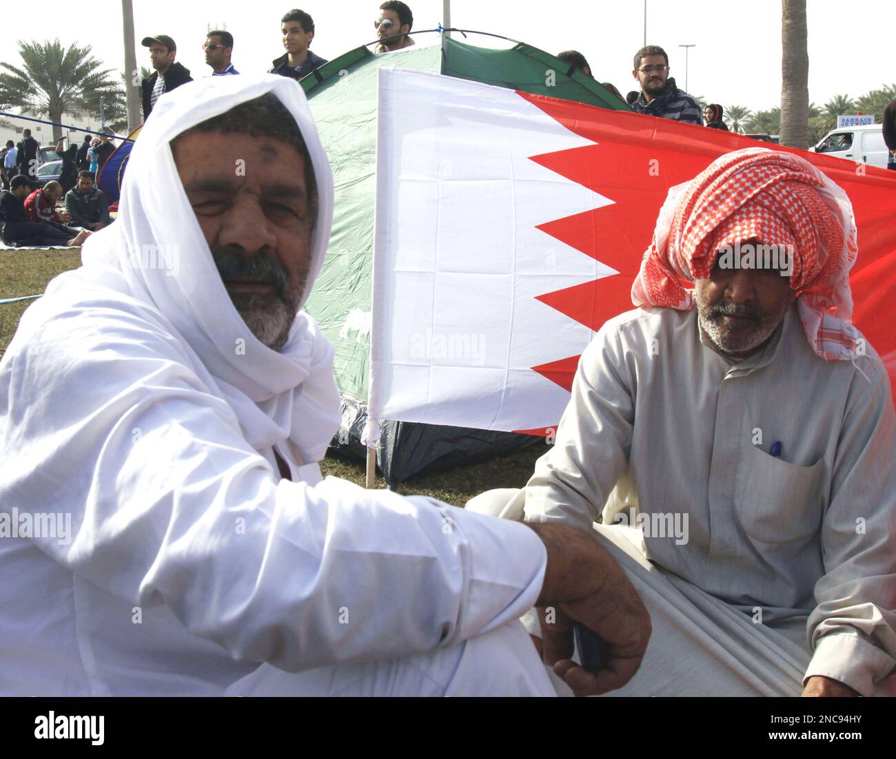 Bahraini anti-government protesters gather at the Pearl roundabout ...